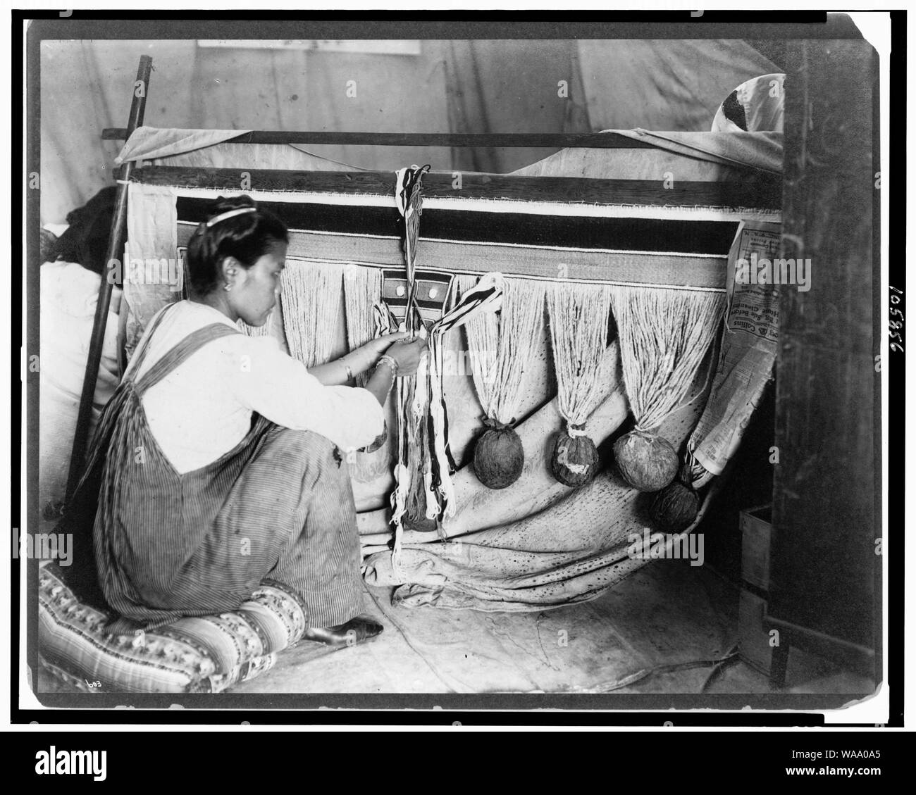 Chilkat woman weaving blanket, Alaska] / Winter & Pond, Juneau, Alaska ...