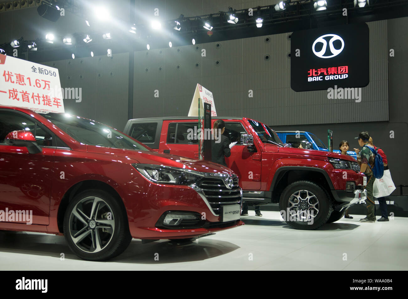--FILE--People visit the stand of BAIC Group during the 16th China ...