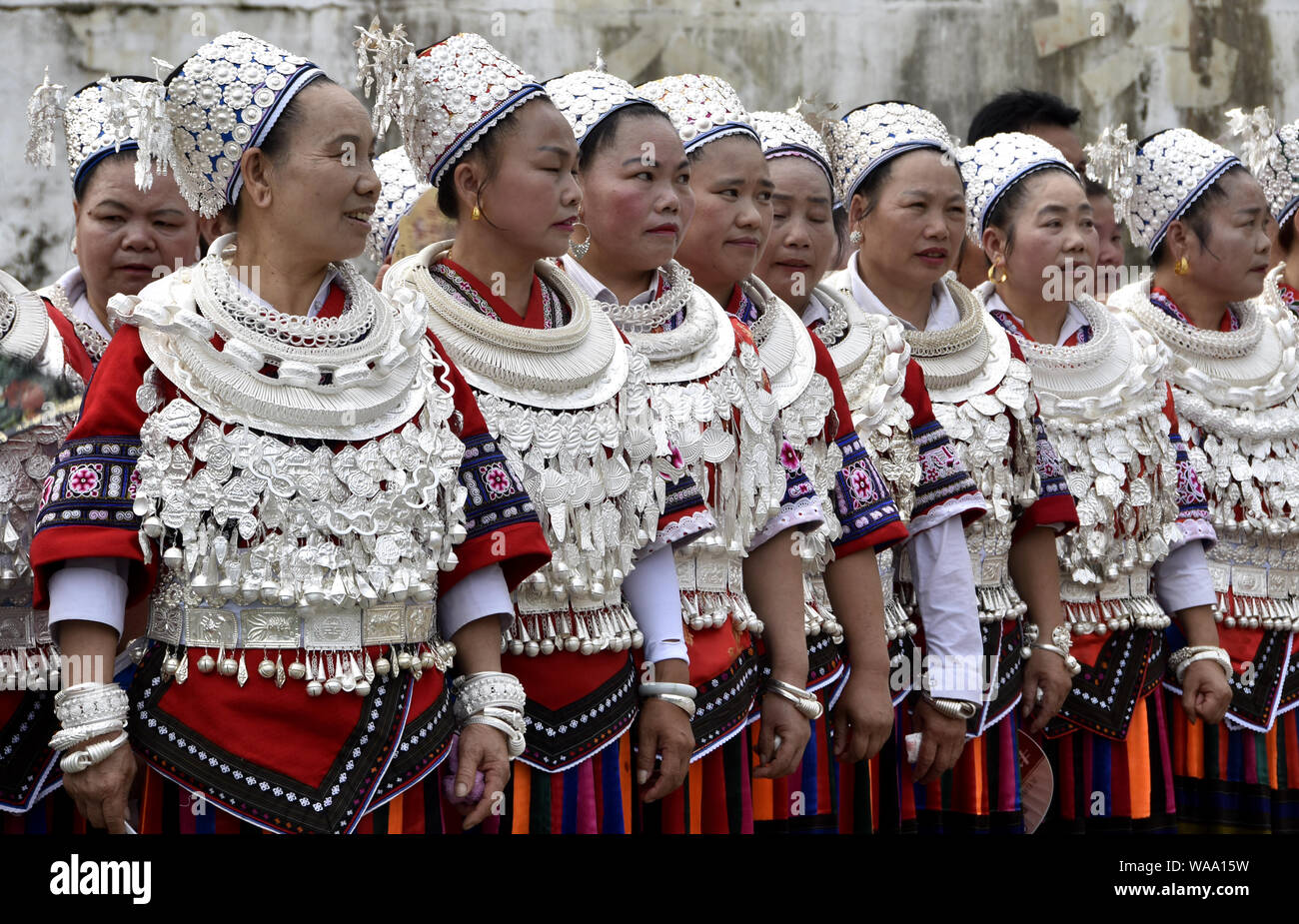 Chinese people of Miao ethnic group wearing traditional costumes and ...