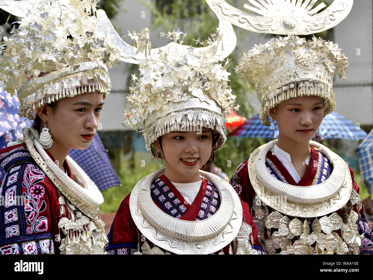 Chinese people of Miao ethnic group wearing traditional costumes and ...
