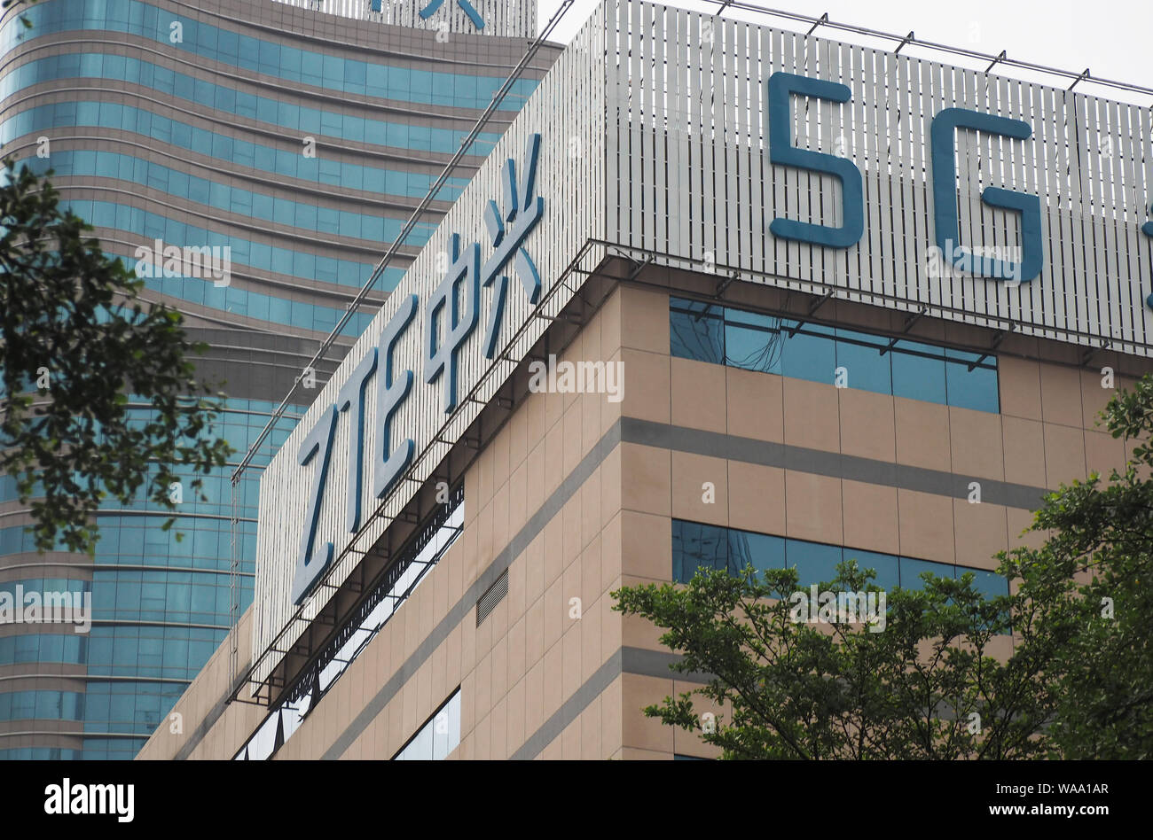 --FILE--Logos of ZTE and 5G are seen on the rooftop of the headquarters ...