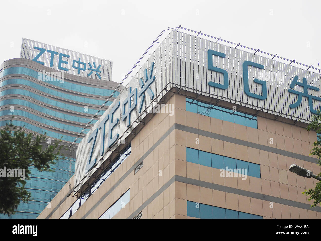 --FILE--Logos of ZTE and 5G are seen on the rooftop of the headquarters ...