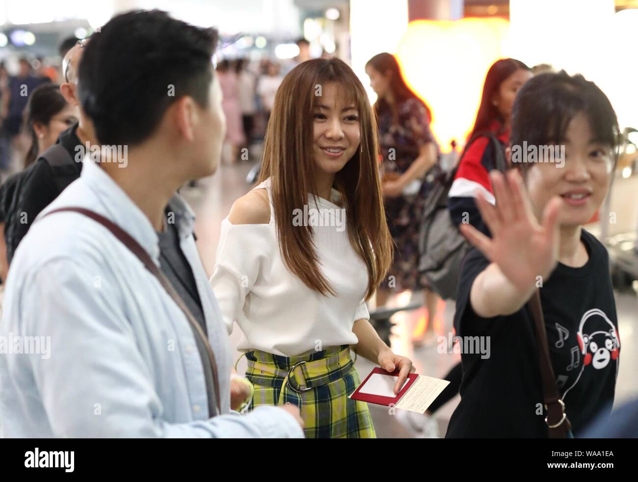Japanese singer Mai Kuraki arrives at the Beijing Capital International ...