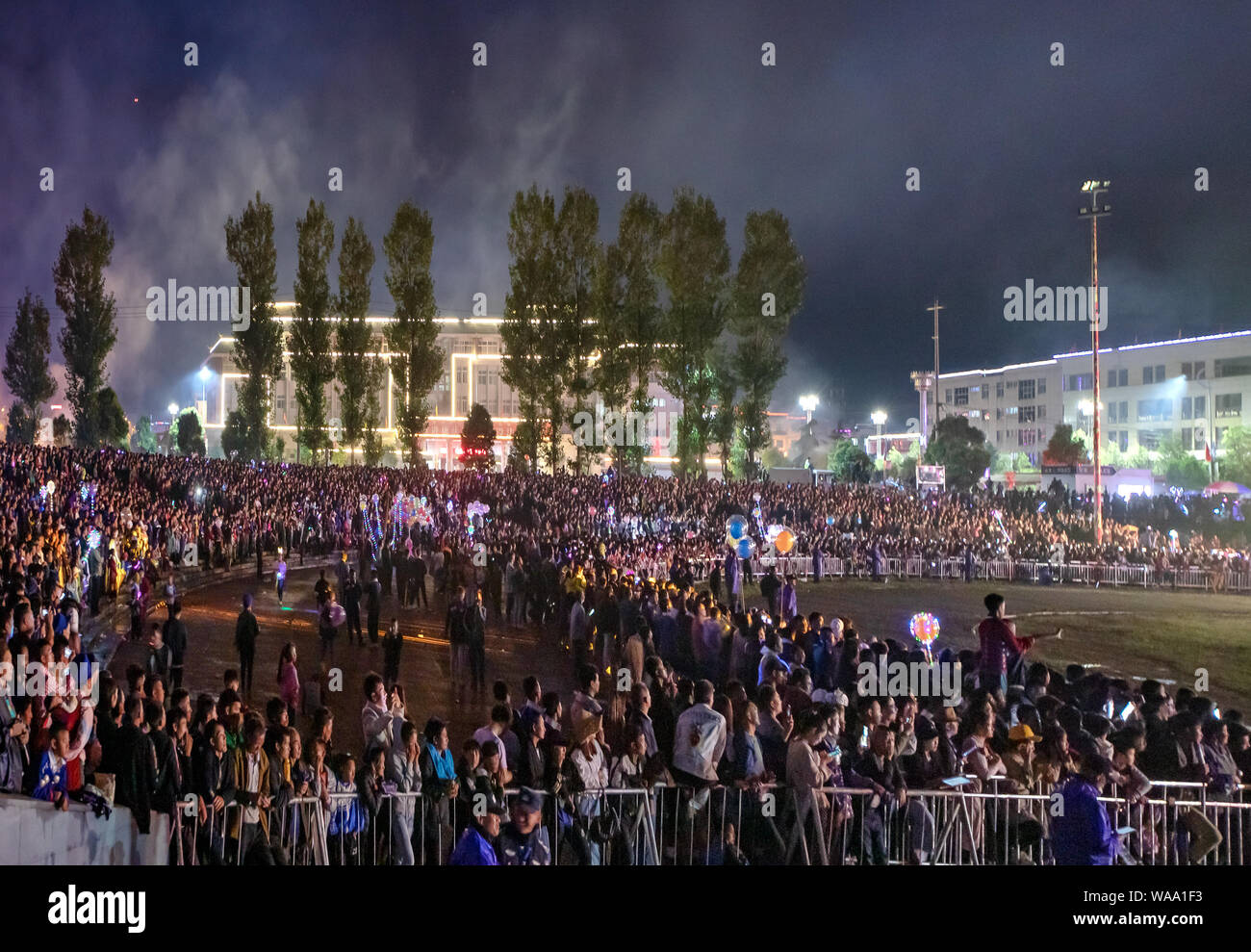 Chinese people of Yi ethnic group gather at a bonfire party to mark the ...