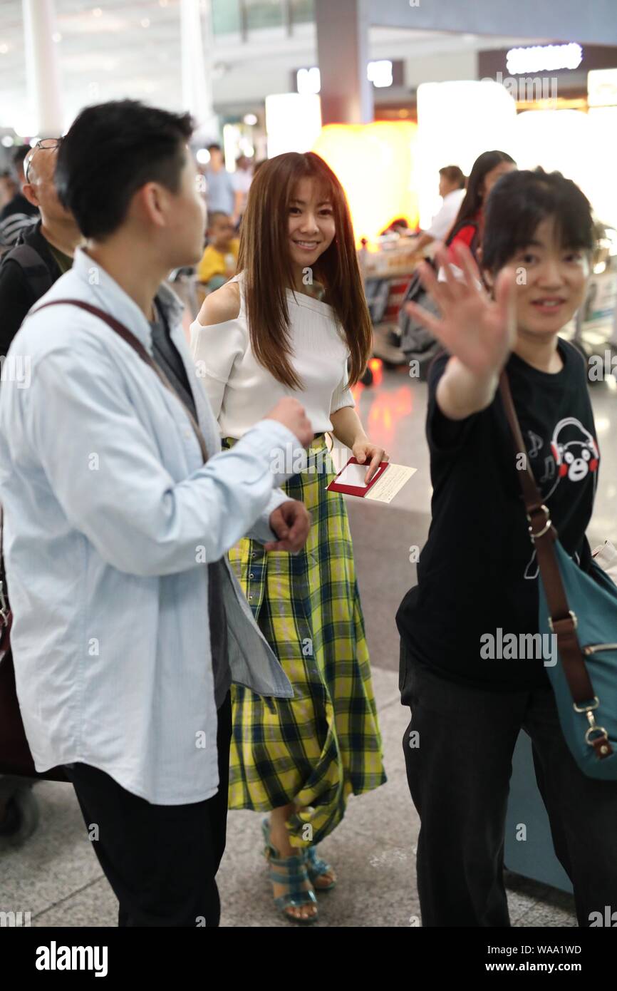 Japanese singer Mai Kuraki arrives at the Beijing Capital International ...