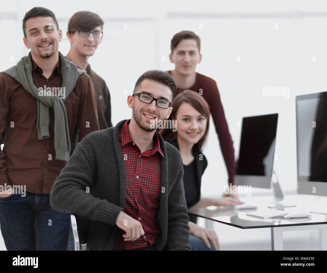 portrait of friendly business team in office Stock Photo - Alamy