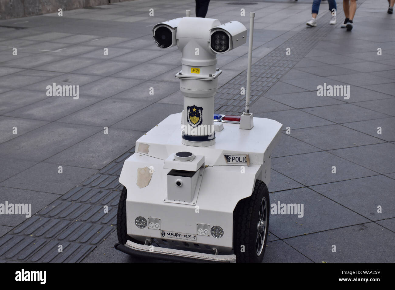 The robot resembling Wall-E in the movie patrolling in the streets of ...