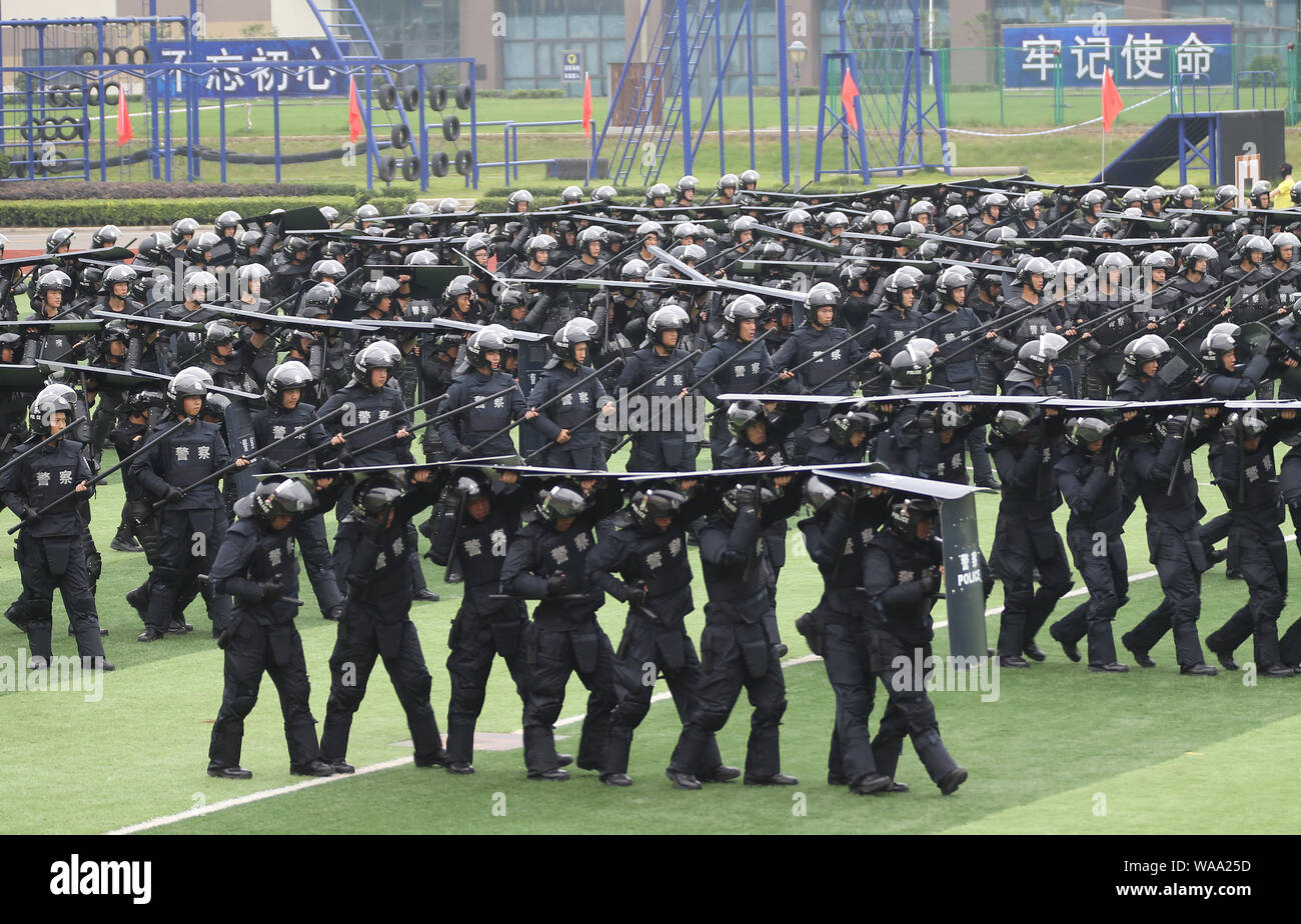 Chinese police officers, including SWAT police officers, take part in a ...