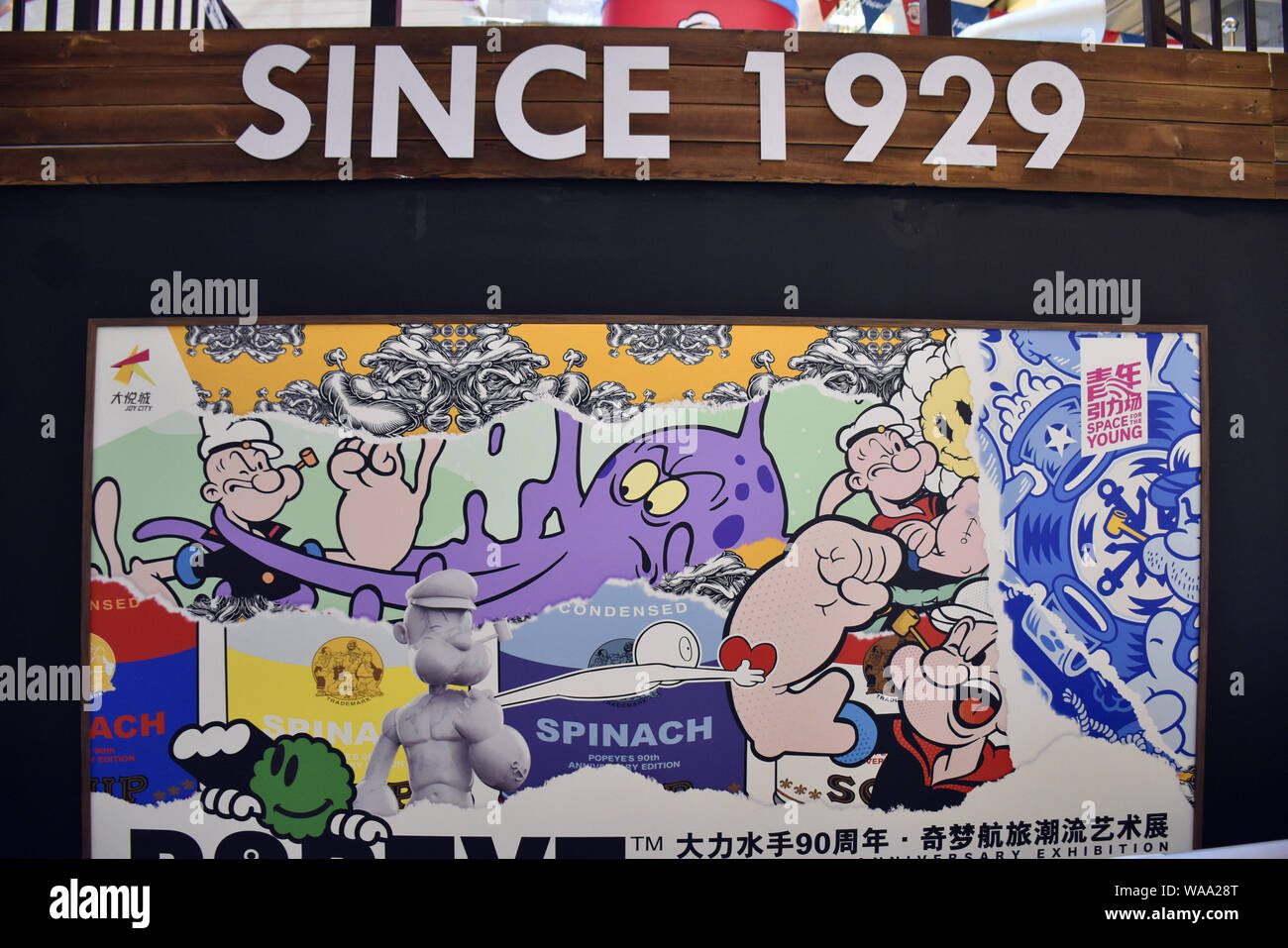 Customers view sculptures featuring cartoon character "Popeye the ...