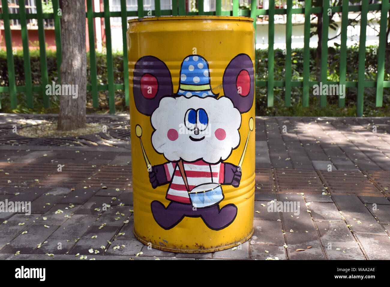 Hundreds of trash bins covered with cartoon characters and tips for ...