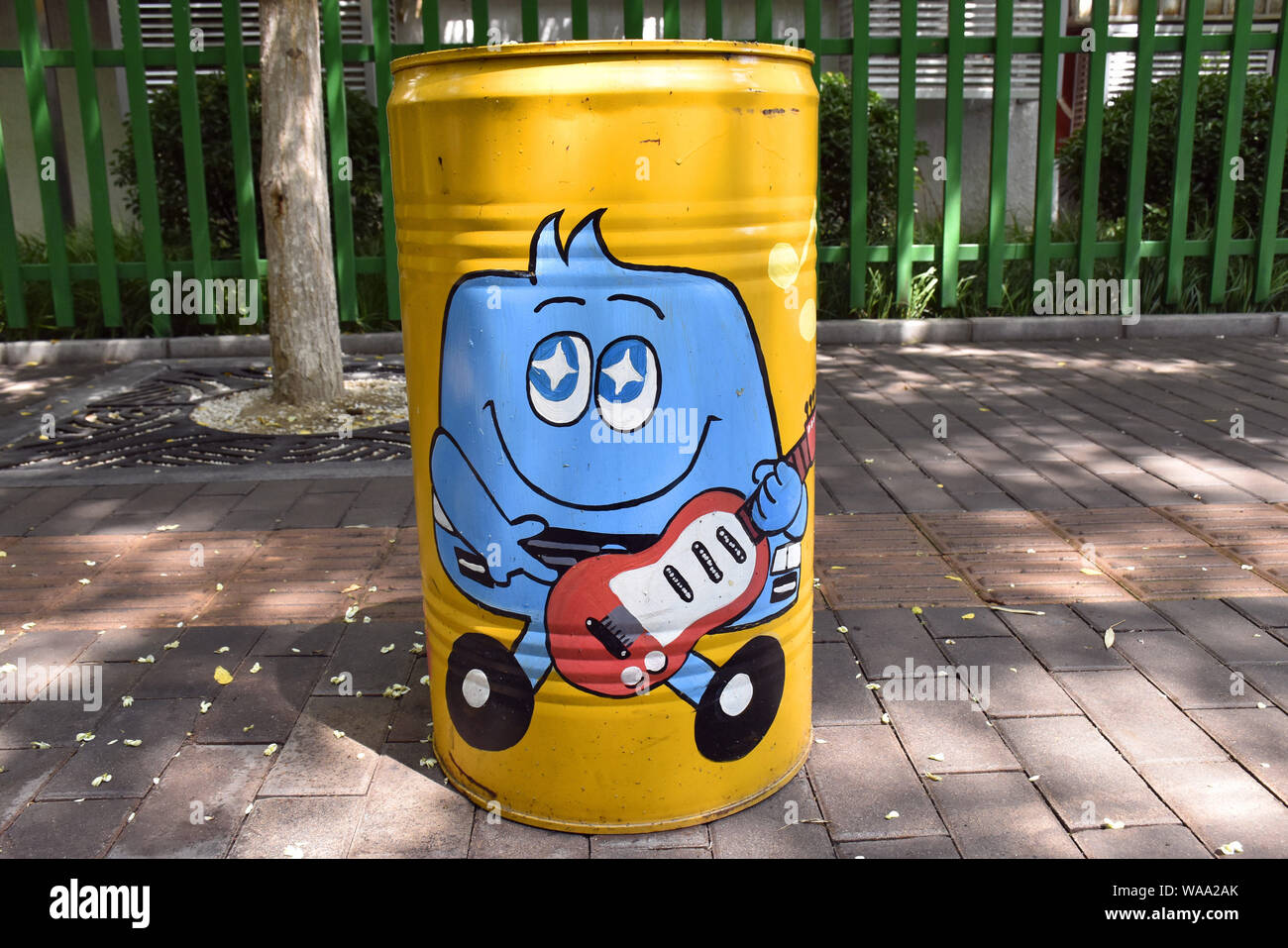 Hundreds of trash bins covered with cartoon characters and tips for ...