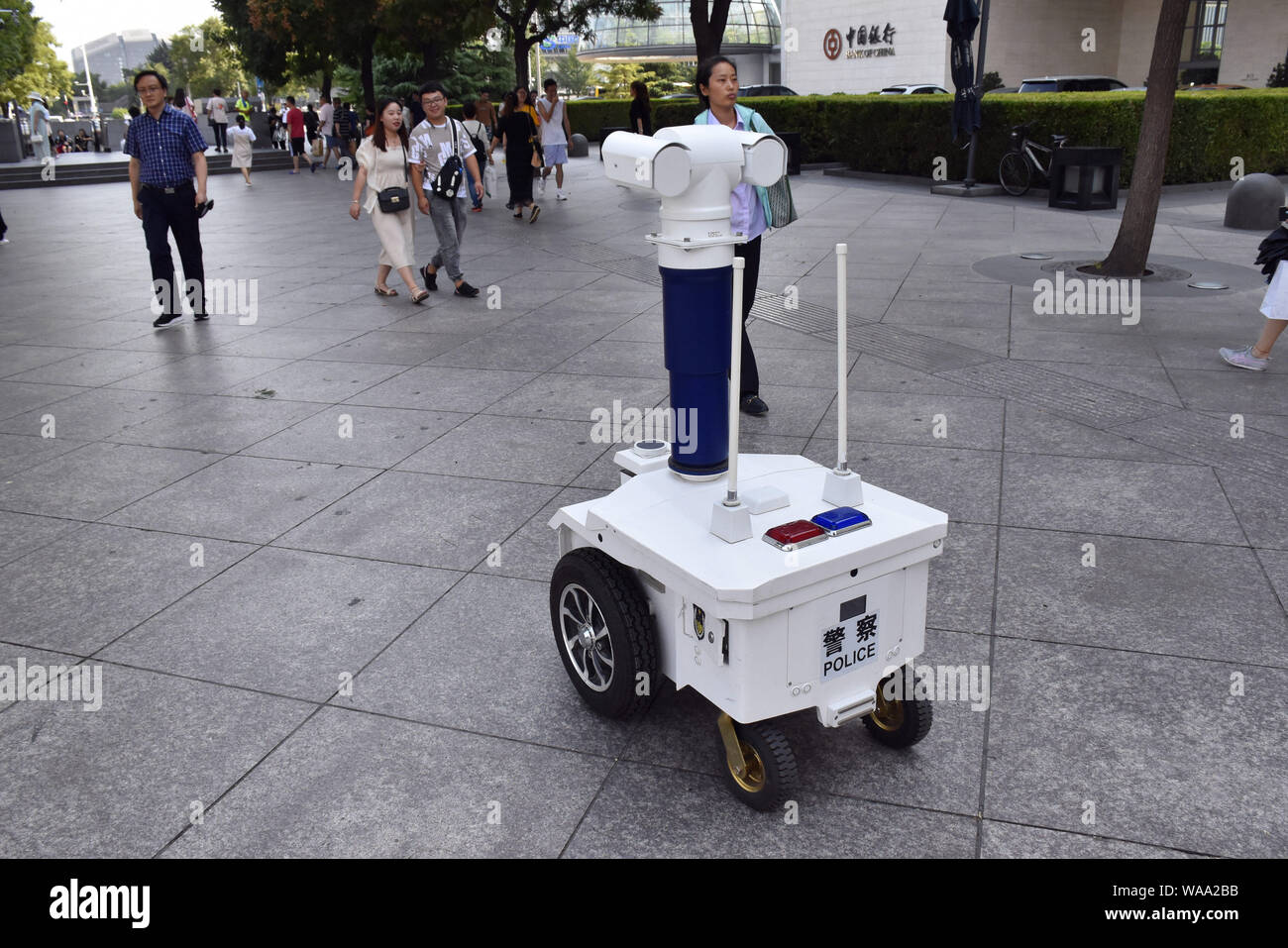 The robot resembling Wall-E in the movie patrolling in the streets of ...