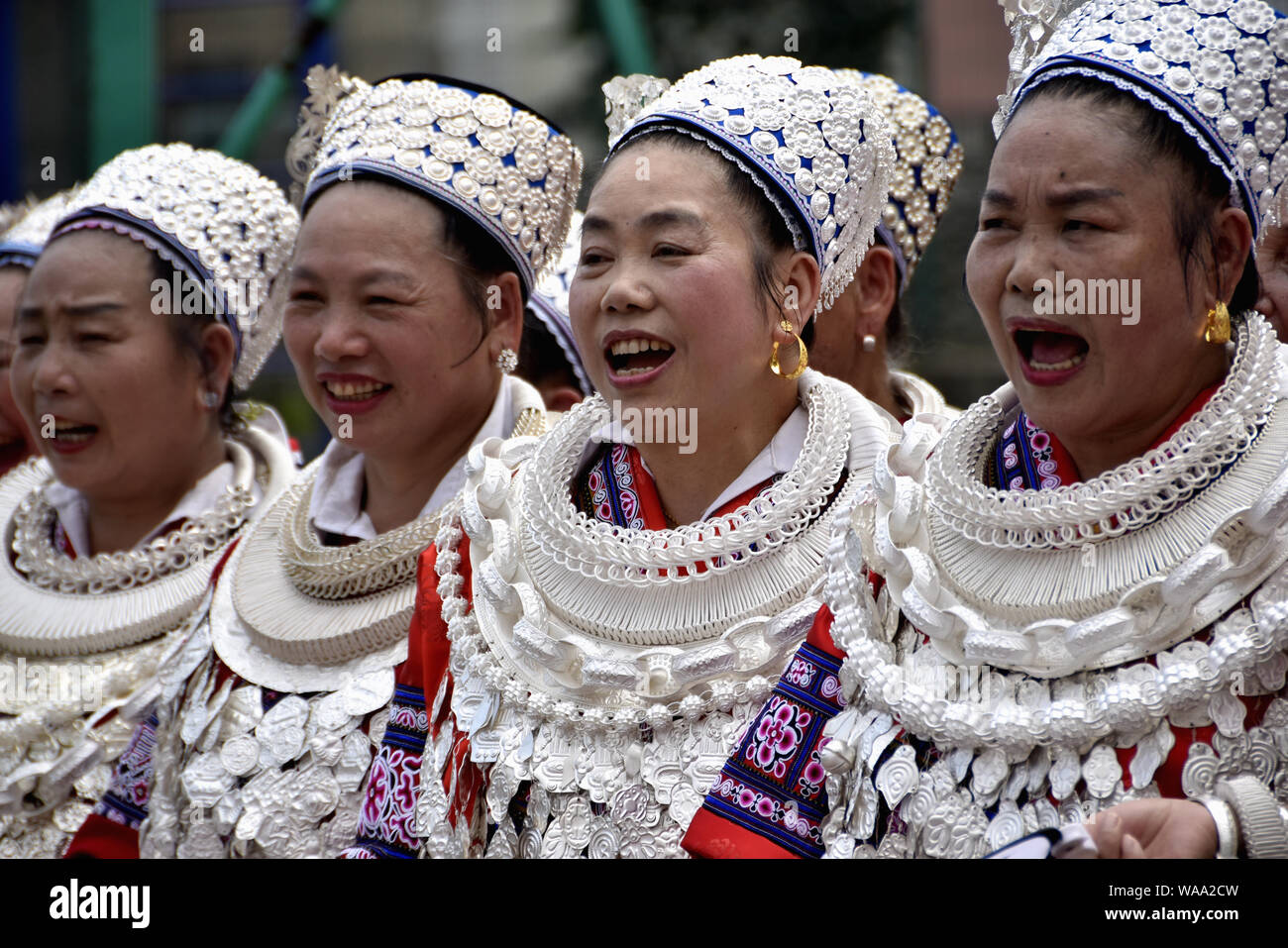 Chinese people of Miao ethnic group wearing traditional costumes and ...