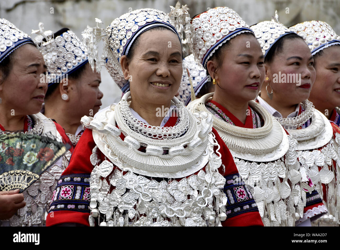 Chinese people of Miao ethnic group wearing traditional costumes and ...