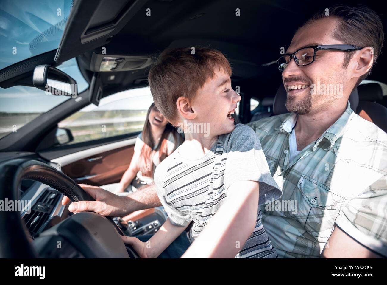 father and his little son driving a car Stock Photo - Alamy