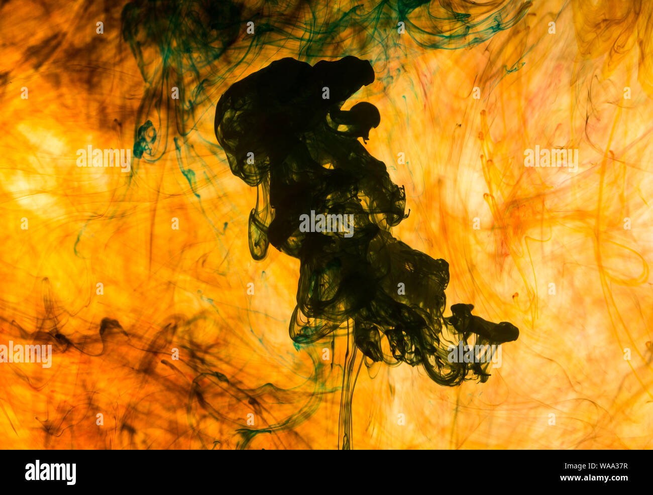 Acrylic colors and ink in water. Abstract background Stock Photo - Alamy
