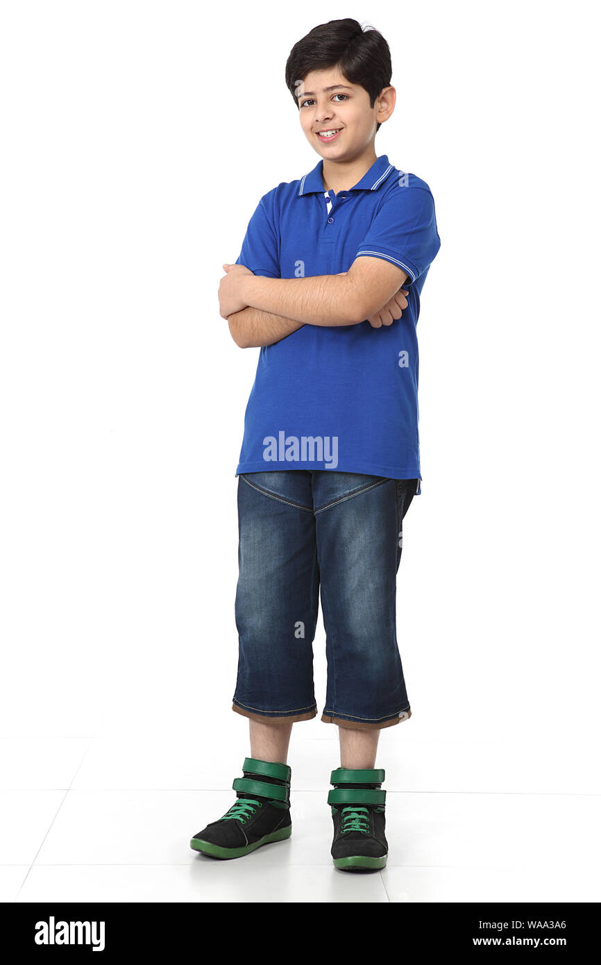 Boy standing with his arms crossed Stock Photo - Alamy