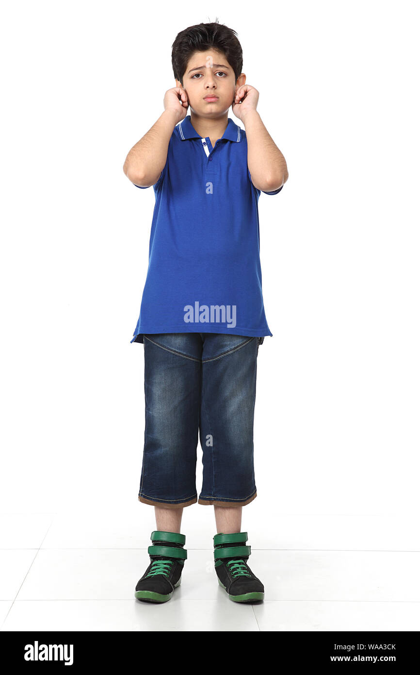 Boy pulling his ears Stock Photo - Alamy
