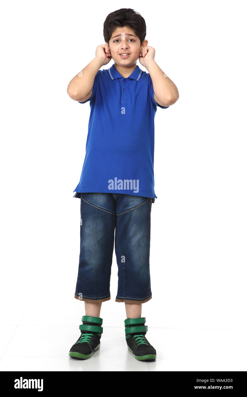 Boy pulling his ears Stock Photo - Alamy