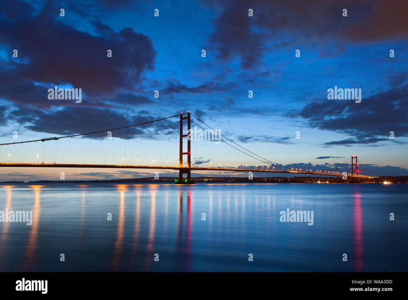 The Humber Bridge over the River Humber after dark at high tide from ...