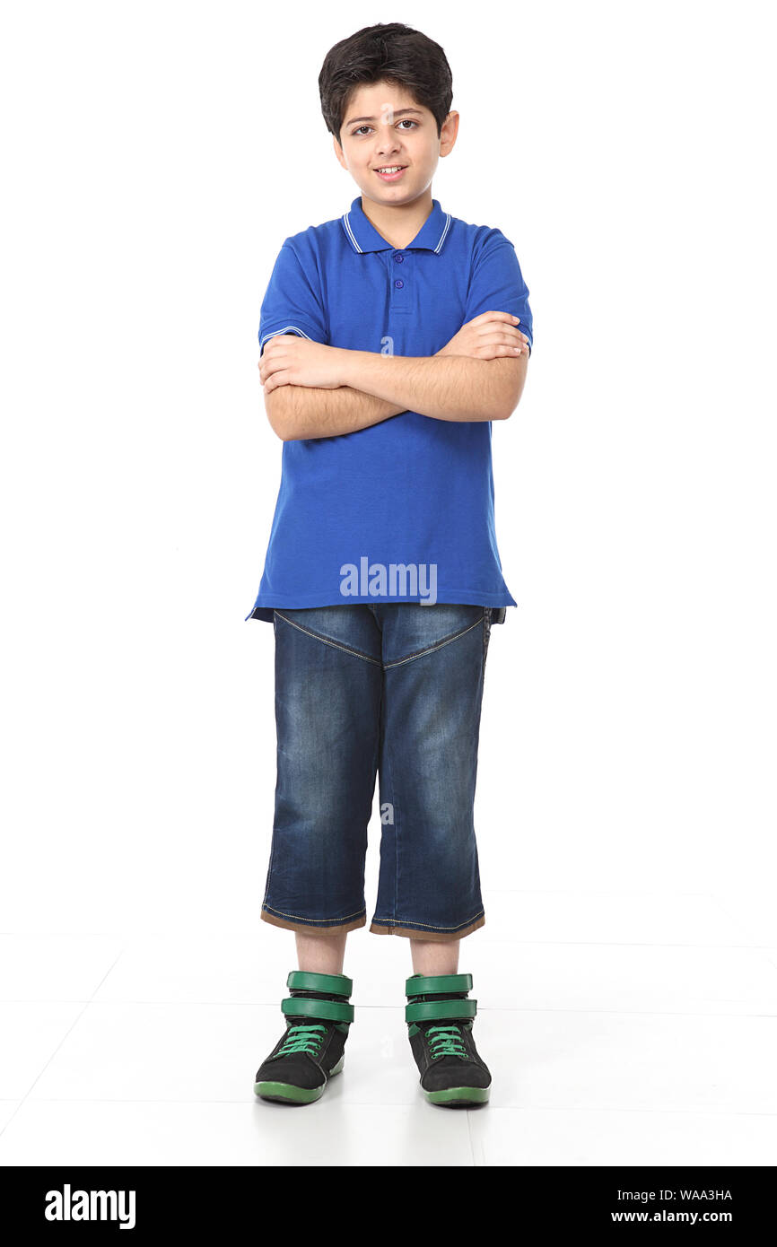 Boy standing with his arms crossed Stock Photo - Alamy