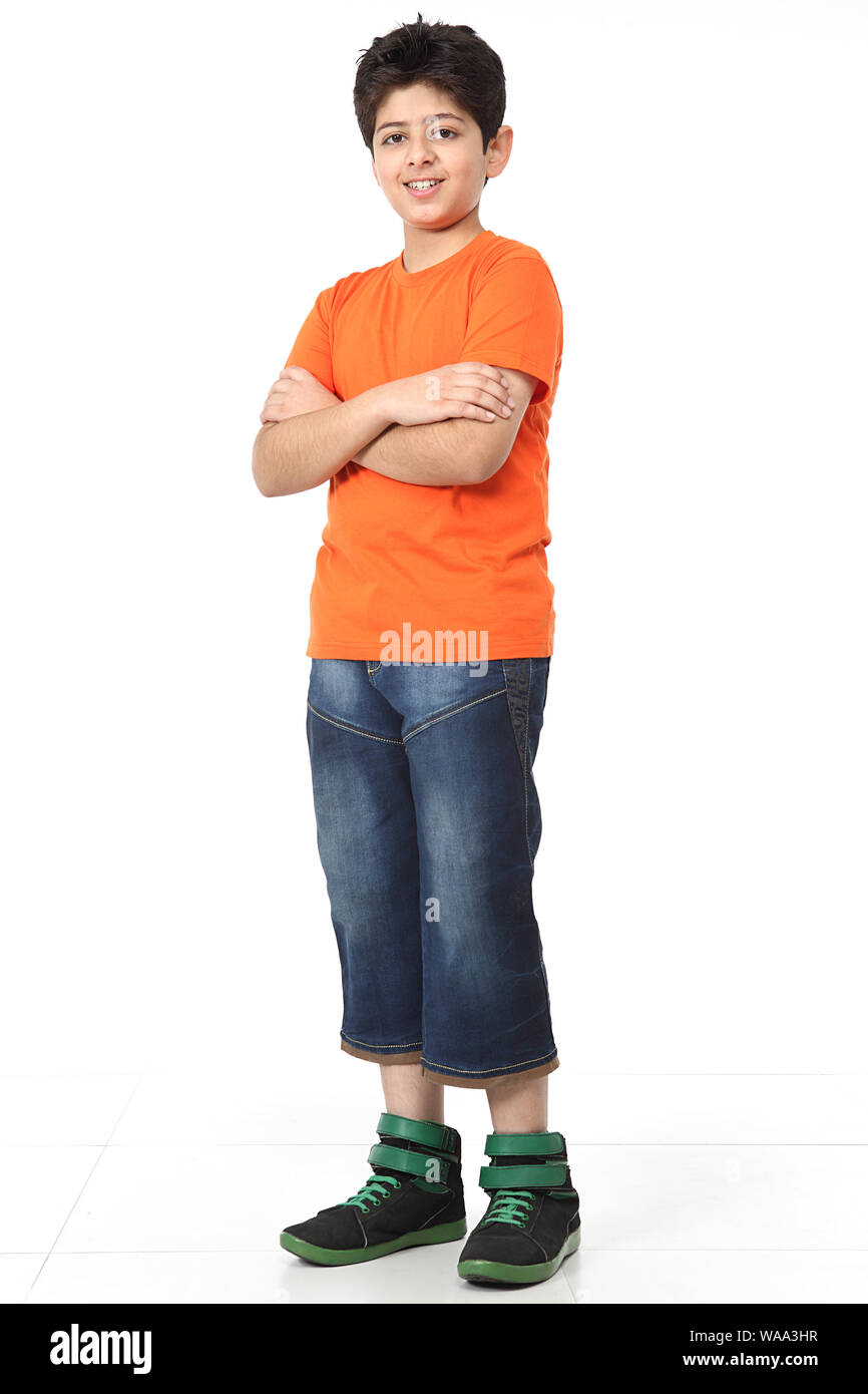 Boy standing with his arms crossed Stock Photo - Alamy