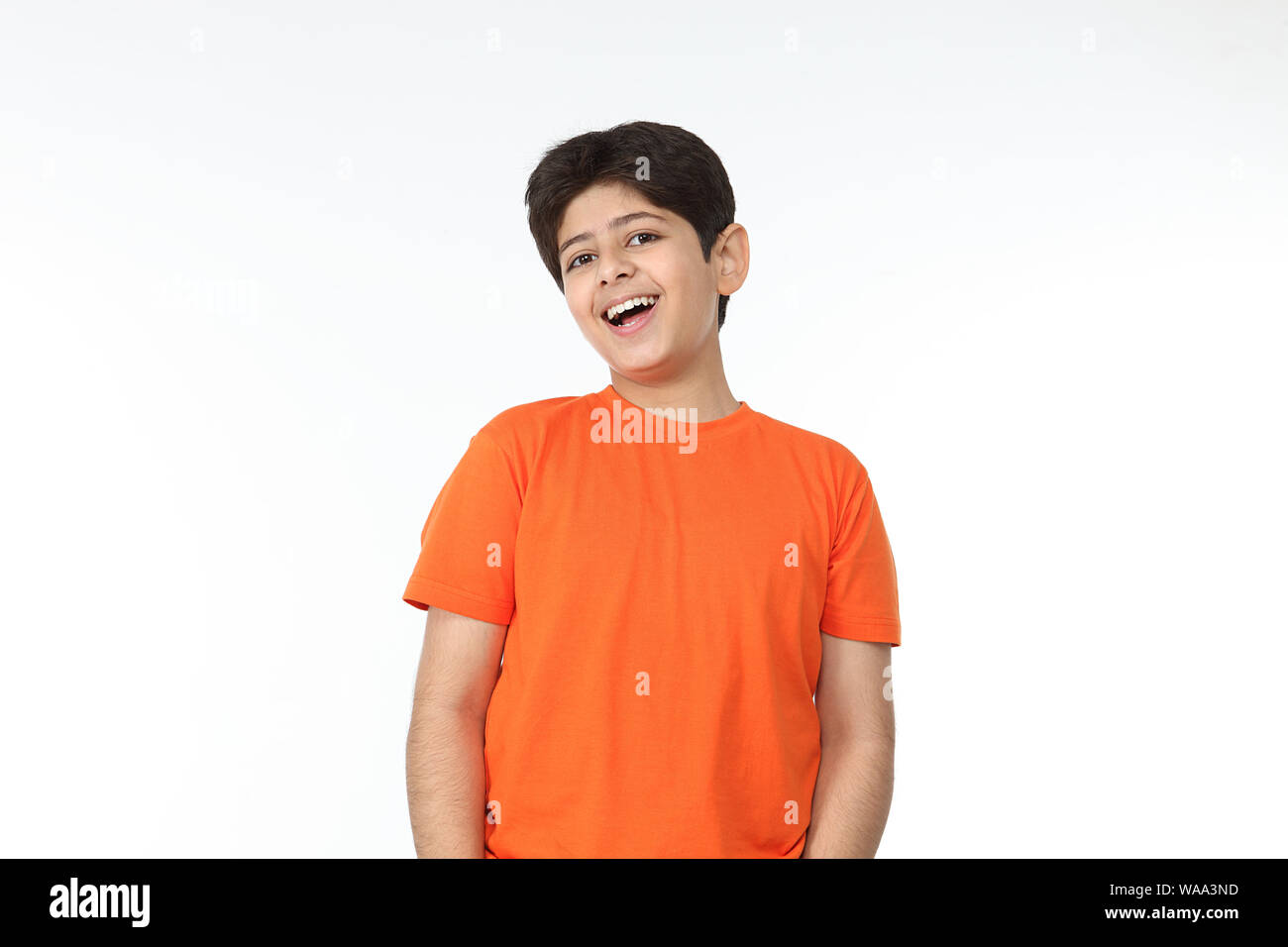 Portrait of a boy laughing Stock Photo - Alamy