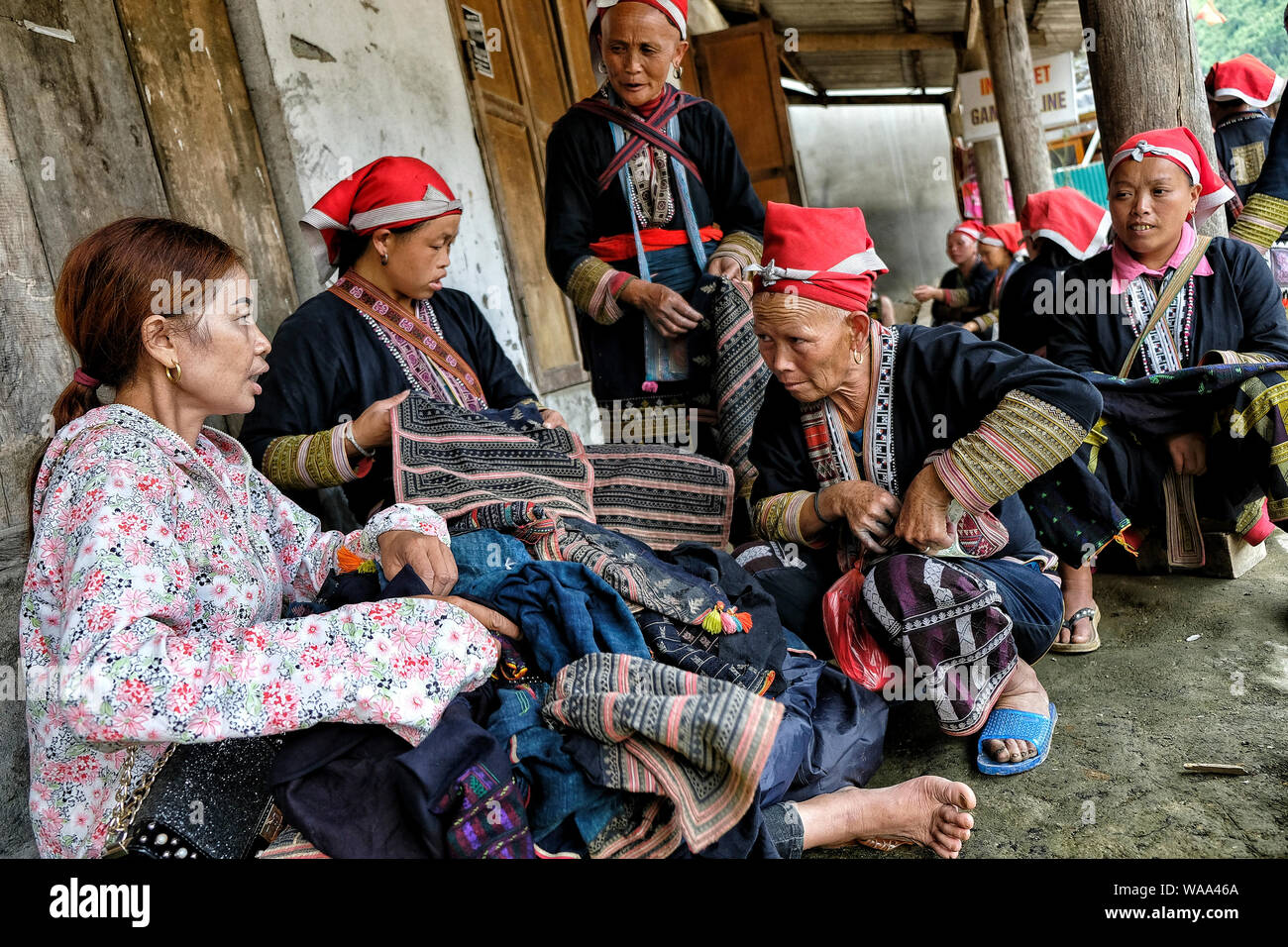 Ta Phin, Vietnam - August 24: Red Dao women sewing in the village on ...
