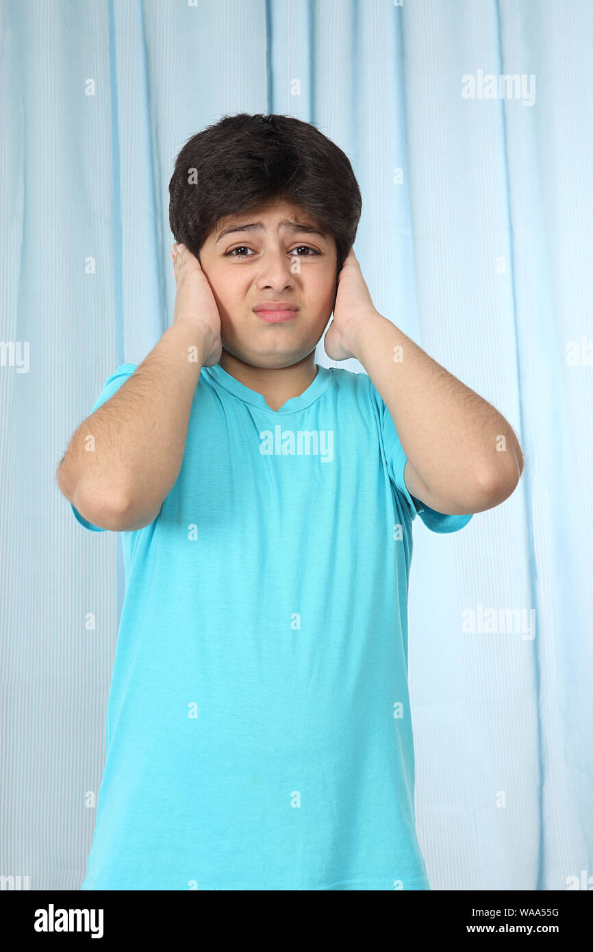 Covering ears child hi-res stock photography and images - Alamy