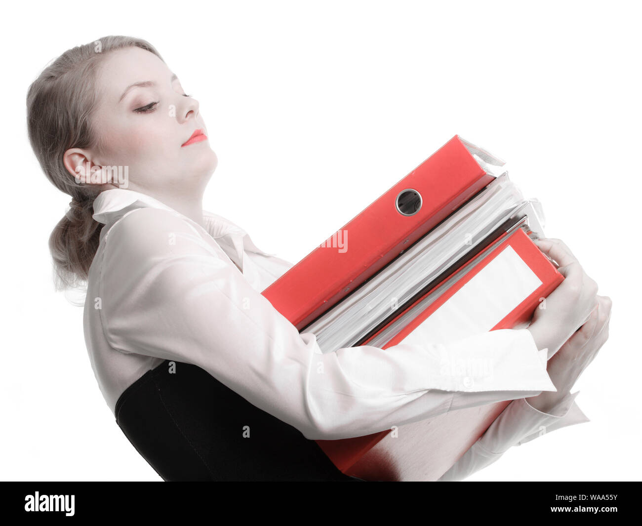Business and paperwork. Young overworked businesswoman holding stack of ...