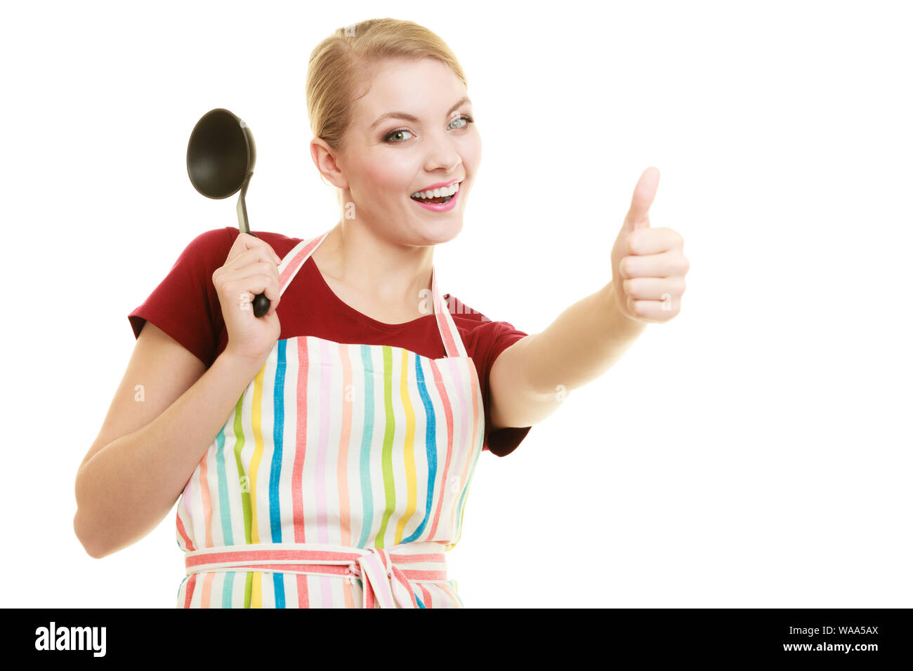 housewife or cook chef in striped kitchen apron with ladle thumb up ...
