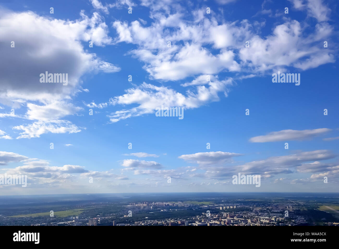 Scenic picture of the city in winter of a aerial, clear blue sky with ...