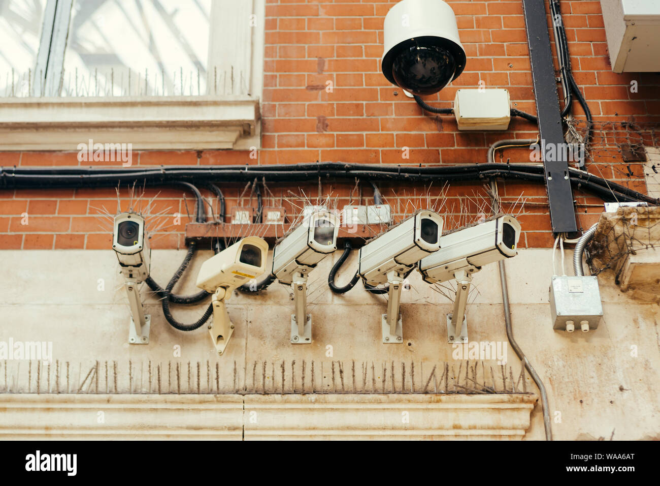 CCTV camers covered with the bird control spikes. Surveillance is used ...