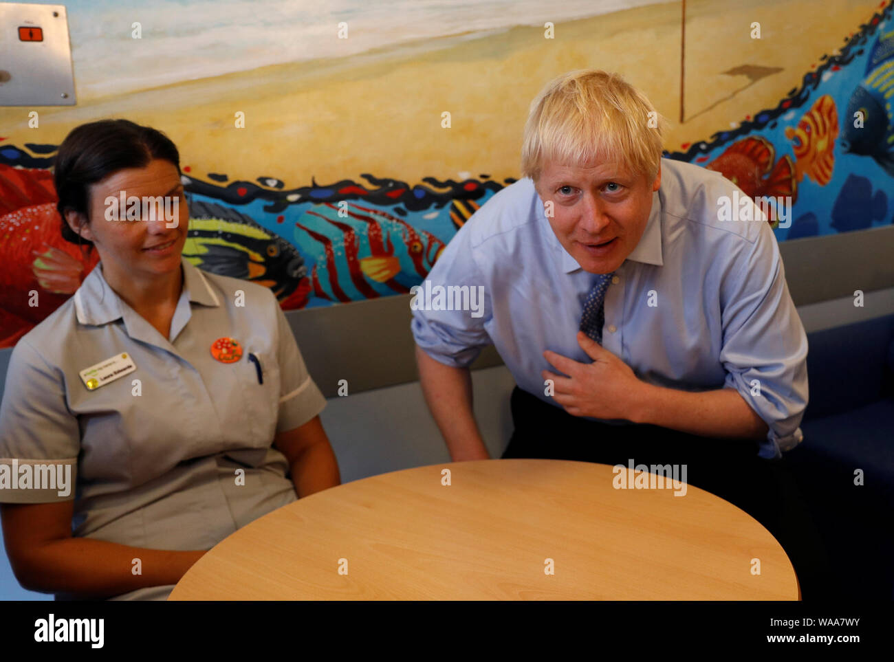 Prime Minister Boris Johnson meets with health professionals during a ...