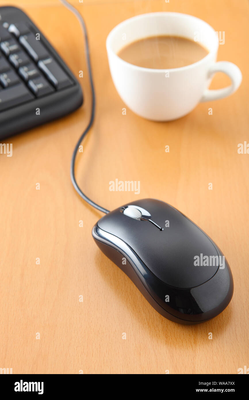 Tea with computer keyboard and mouse Stock Photo - Alamy