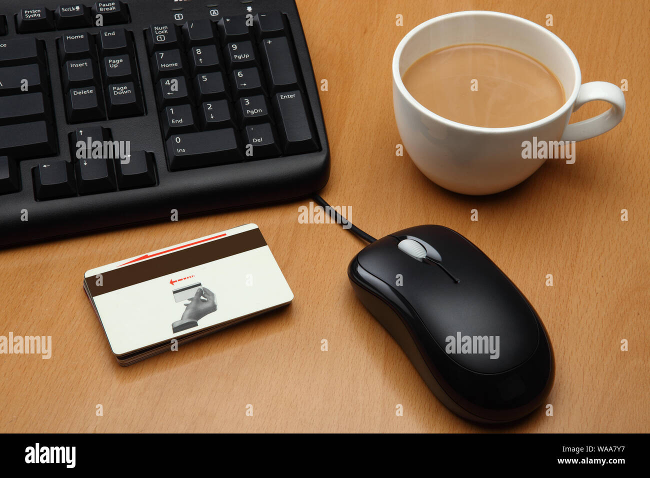 Tea with computer keyboard and mouse Stock Photo - Alamy