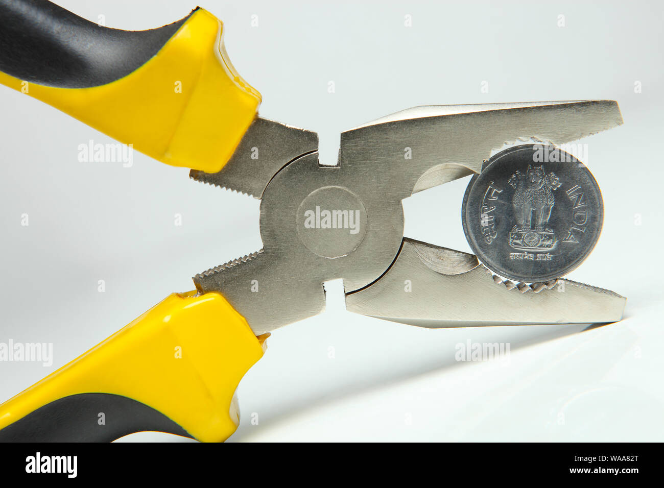 Squeezing money hi-res stock photography and images - Alamy