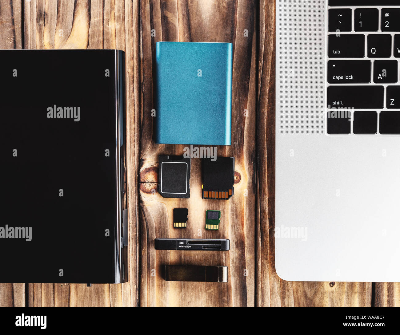 external hardisk, sd card and ssd card on table Stock Photo - Alamy
