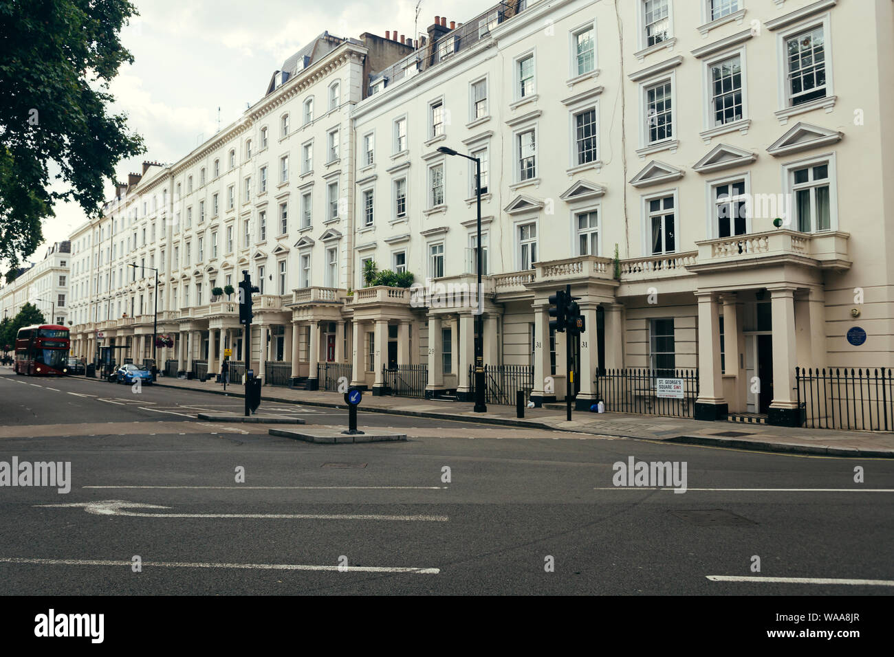 London / UK - July 16, 2019: tall white, 1840s classical residential ...