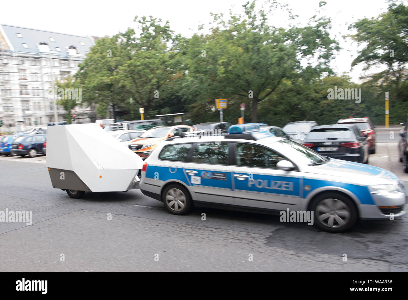 Berlin, Germany. 19th Aug, 2019. A radar trap is being pulled by a ...