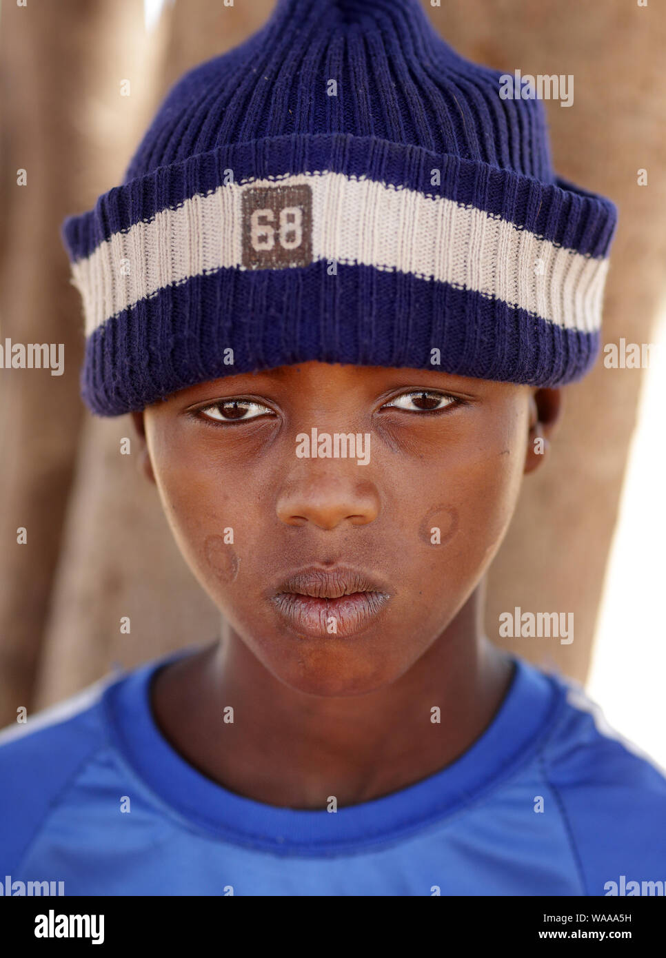 Maasai boy with traditional scars on the cheeks in Loitoktok, Kenya ...