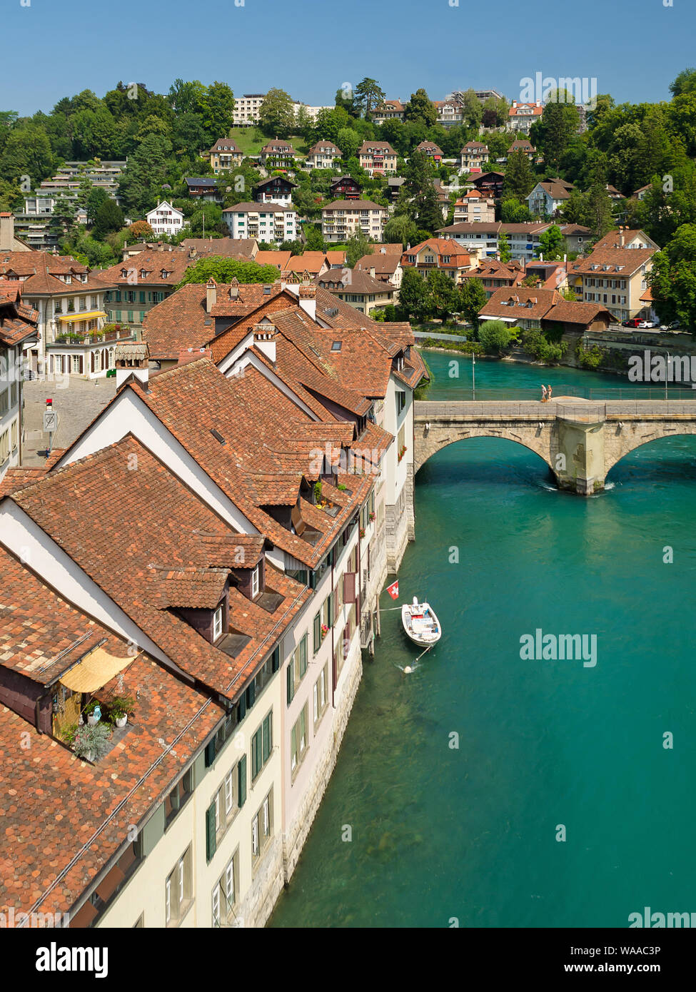 Bern Switzerland view of the river, rooftops, and Nydeggbrucke bridge ...