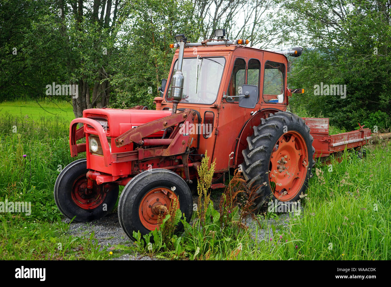 Tractor with forest hi-res stock photography and images - Alamy