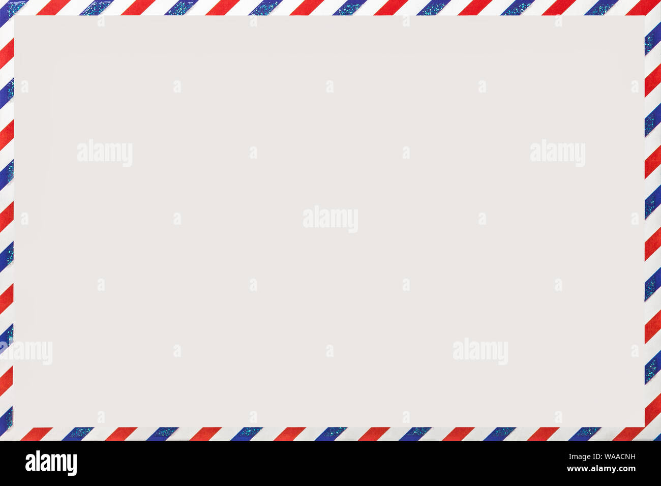 Old post striped envelope, background with copy space. White mail ...