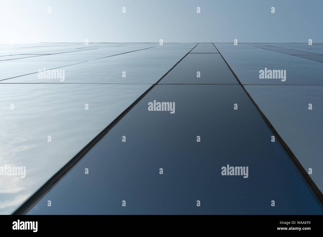 Mirror wall design of shopping center, copy space. Bottom view to ...