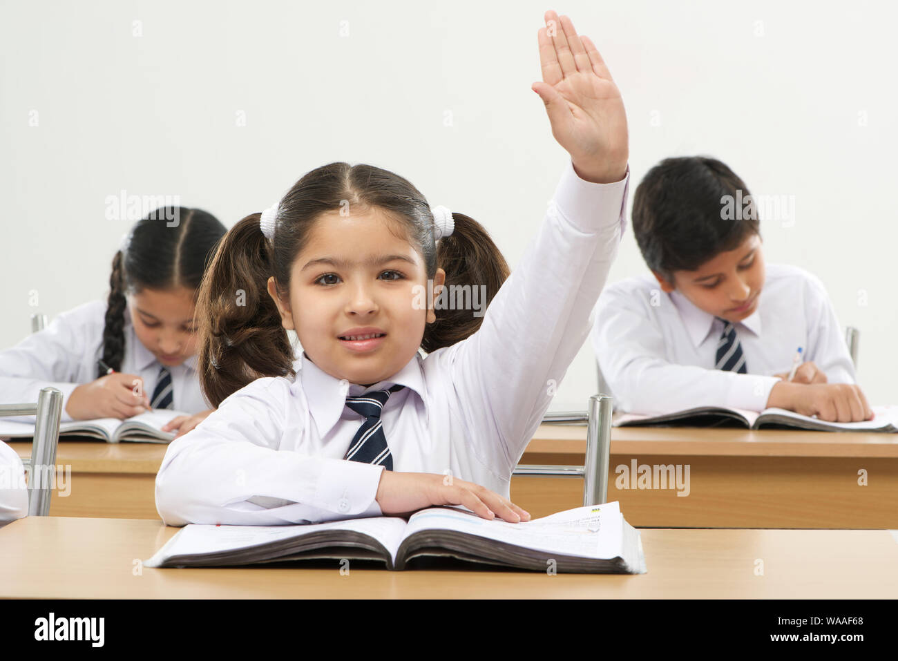 School children studying in a classroom Stock Photo - Alamy