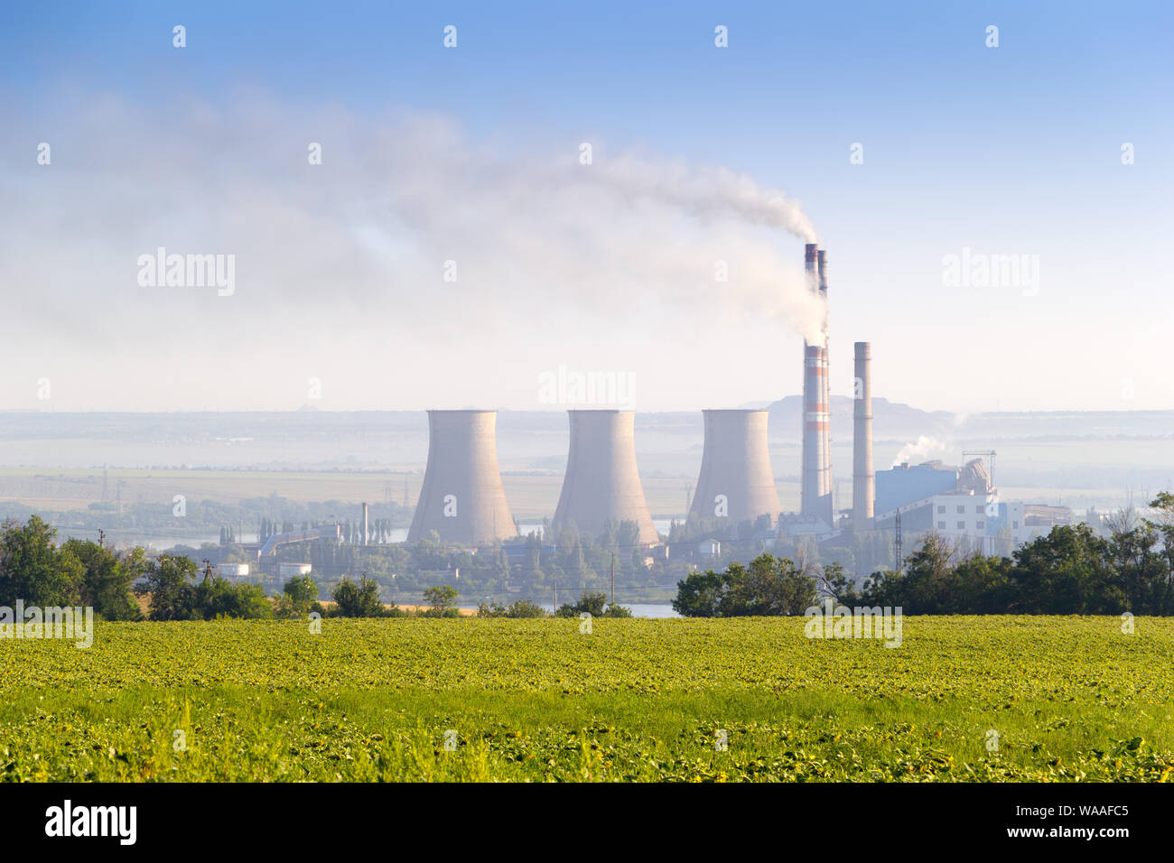 Environmental pollution concept. Pipes and towers of the thermoelectric ...
