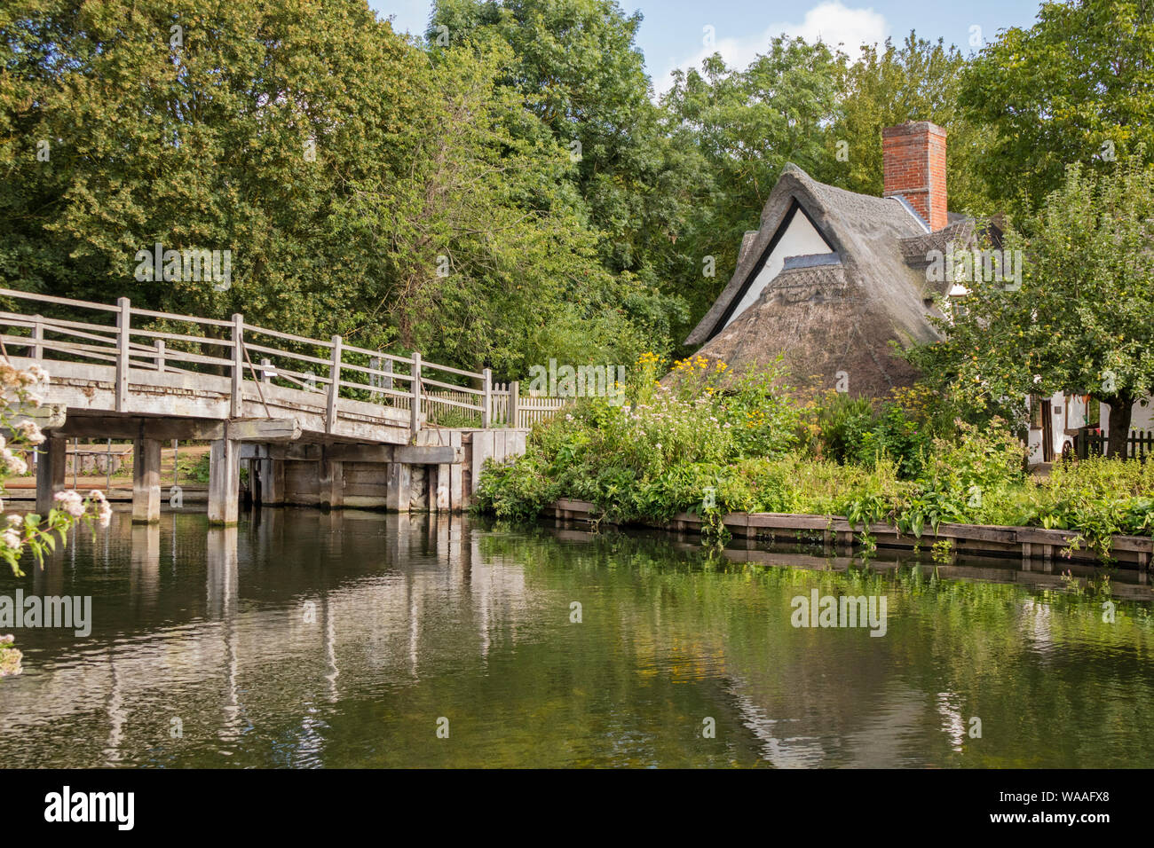 Bridge Cottage on the River Stour at the National Trust's Flatford Mill ...