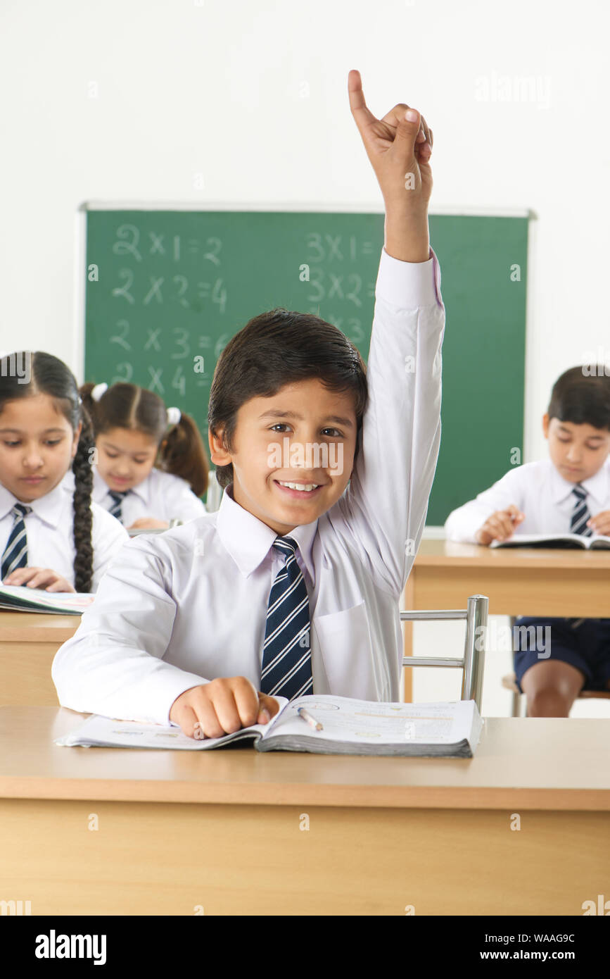 School children studying in a classroom Stock Photo - Alamy