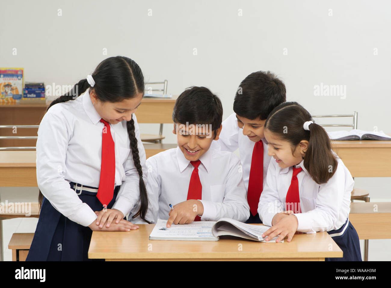 School children studying in a classroom Stock Photo - Alamy